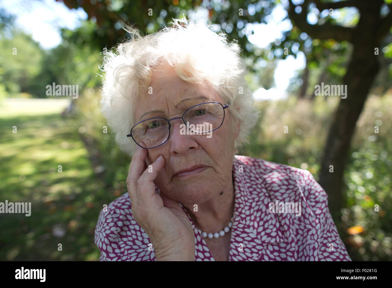 Old age pensioner looking pensive, England, UK Stock Photo - Alamy