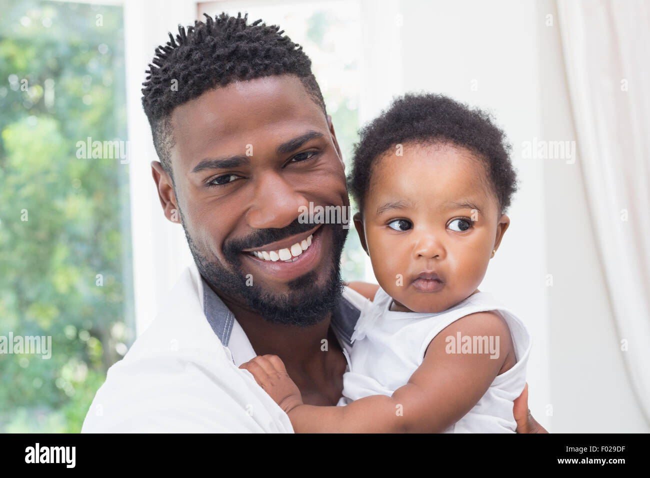Happy father with baby girl Stock Photo - Alamy