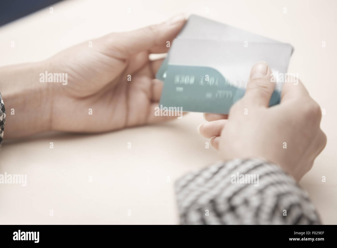 Woman holding two plastic credit cards. Horizontal photo Stock Photo ...