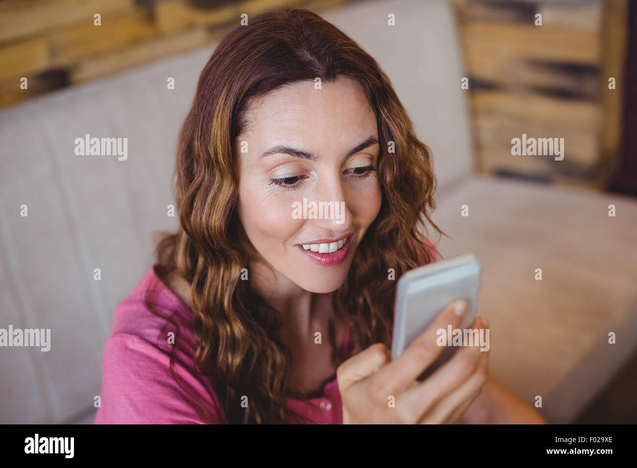 Woman using the phone Stock Photo - Alamy