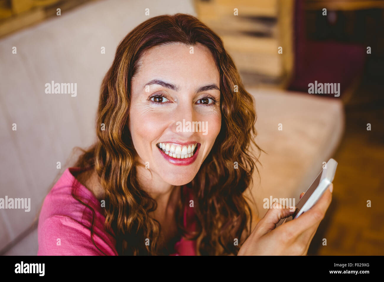 Woman relaxing cafe using mobile hi-res stock photography and images ...
