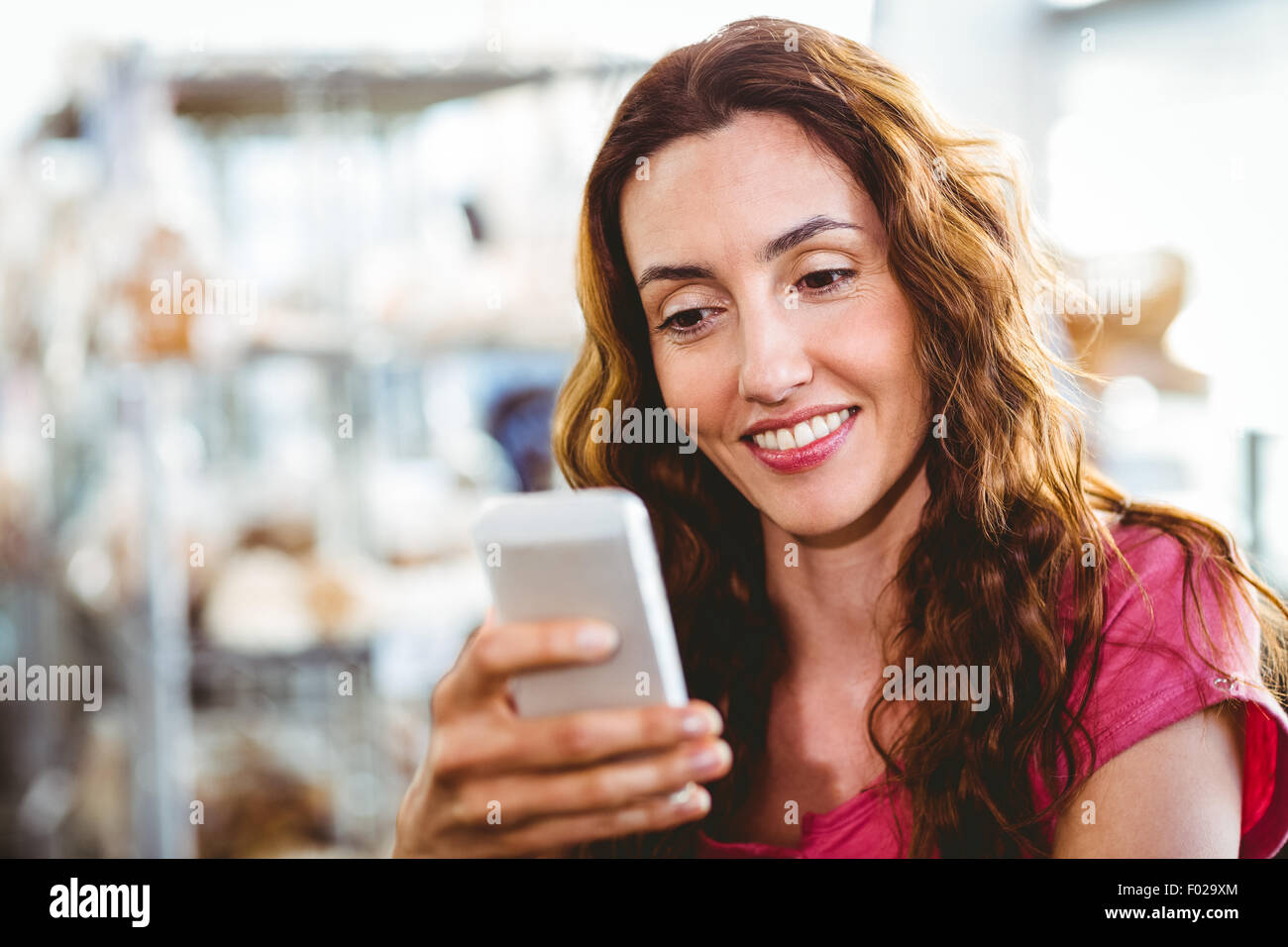 Woman using the phone Stock Photo - Alamy