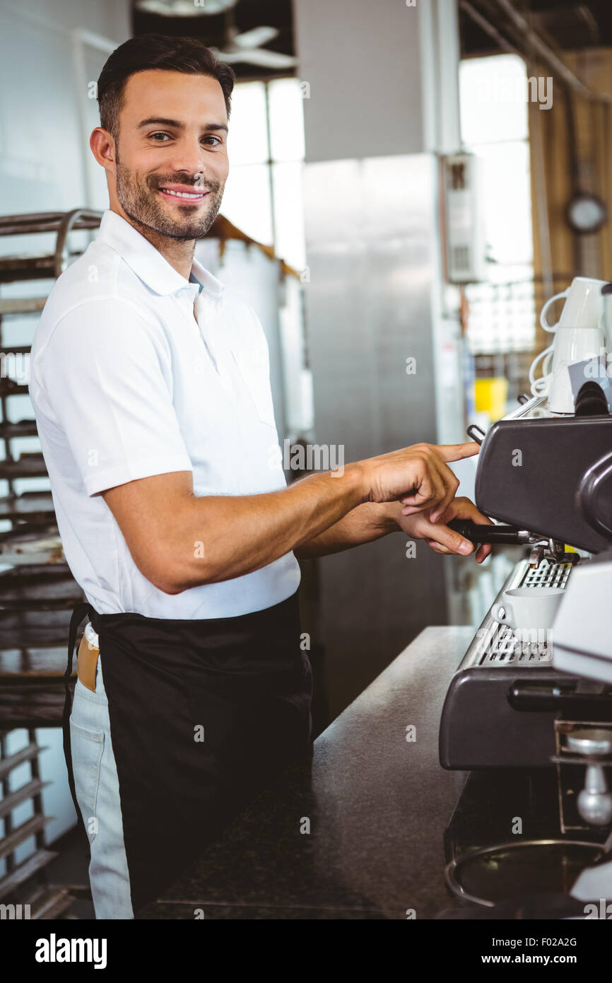 happy worker making coffee Stock Photo - Alamy