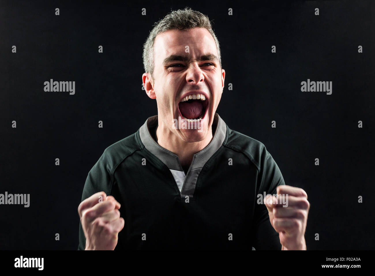 Excited rugby player yelling out Stock Photo - Alamy