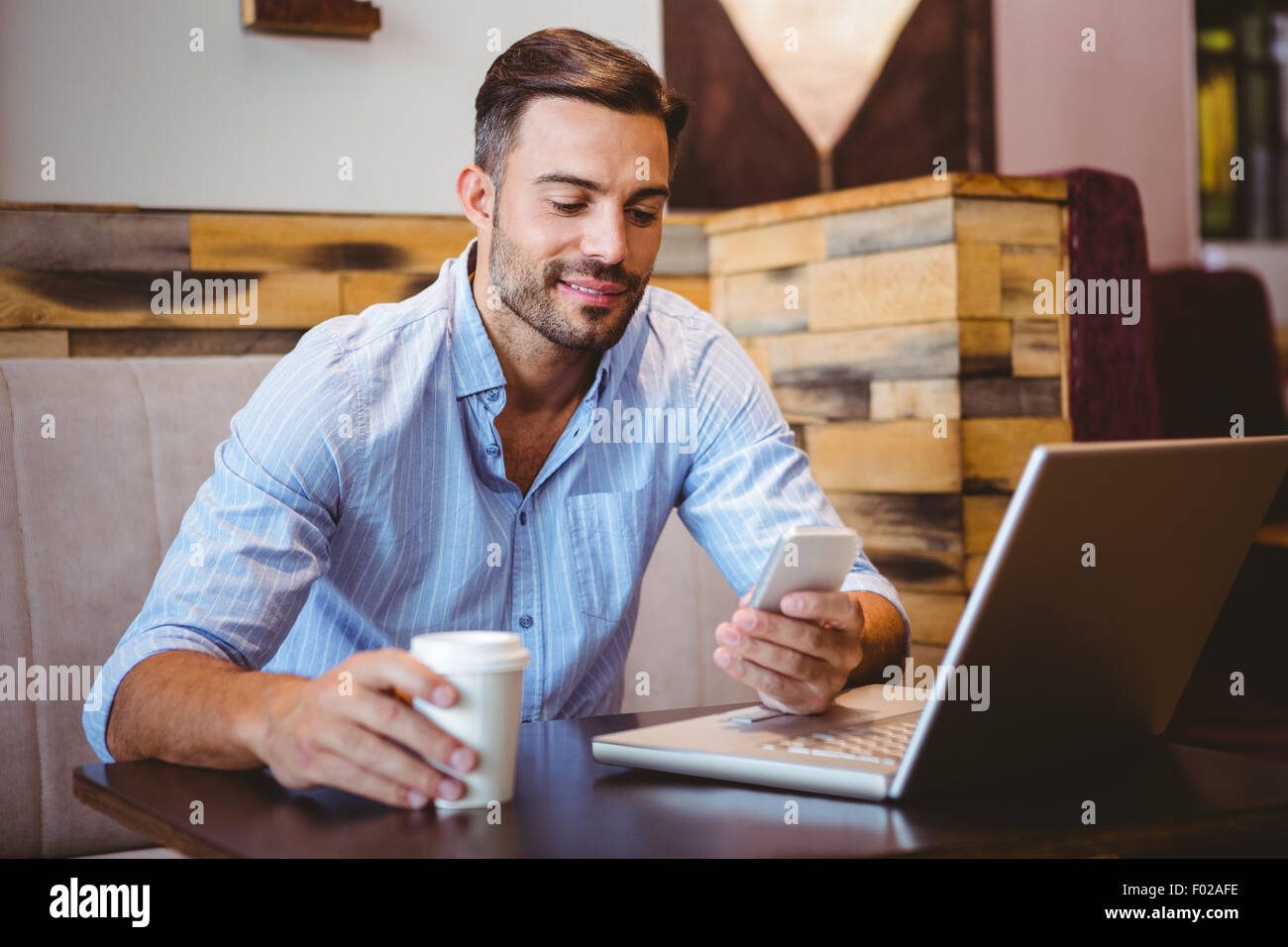 Smiling businessman sending a text message Stock Photo - Alamy Smiling businessman sending a text message Stock Photo - Alamy