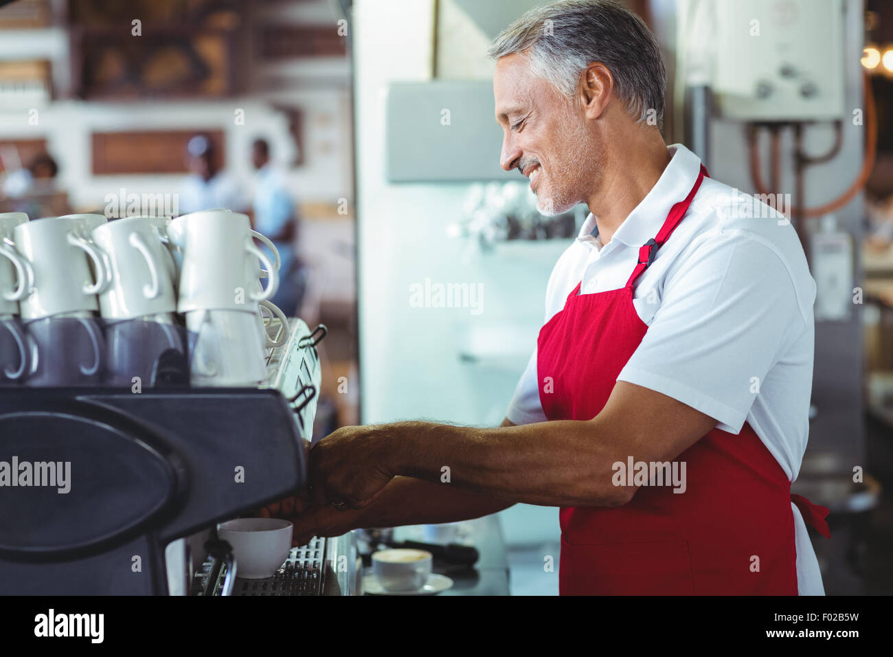 Barista espresso machine making man employee worker working hi-res ...