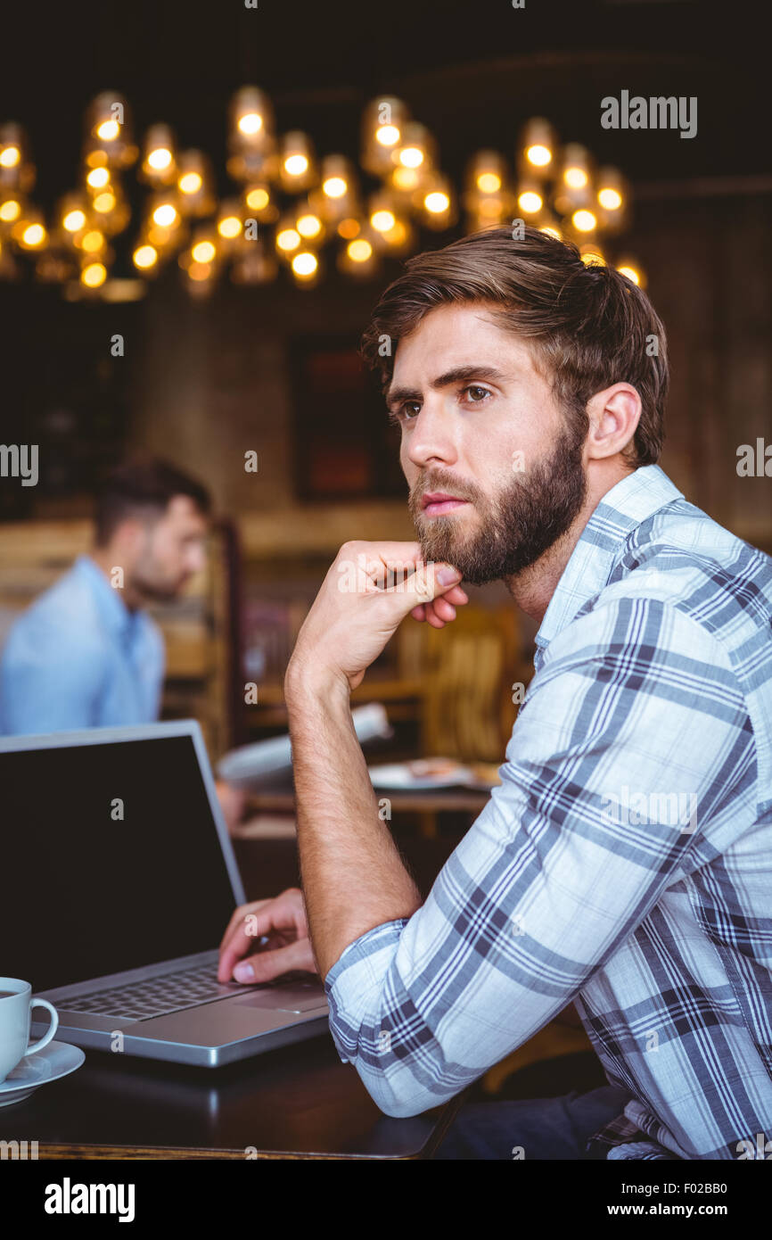 young man working on his computer Stock Photo - Alamy