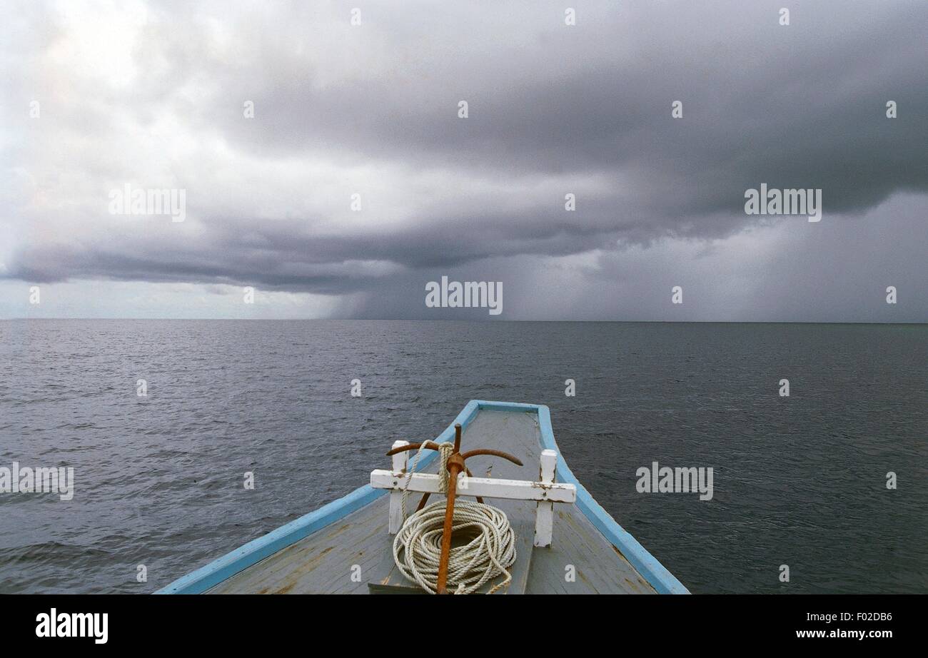 Dark clouds at sea announcing oncoming storm Stock Photo - Alamy