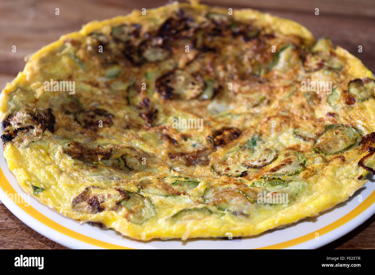 omelette of zucchini made with organic eggs Stock Photo - Alamy