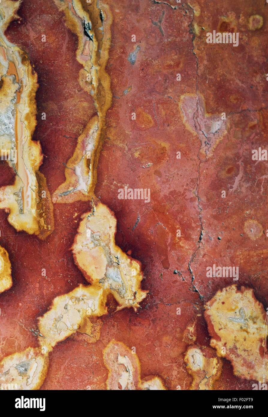Red marble Vitrolles, crystalline limestone rock Stock Photo - Alamy