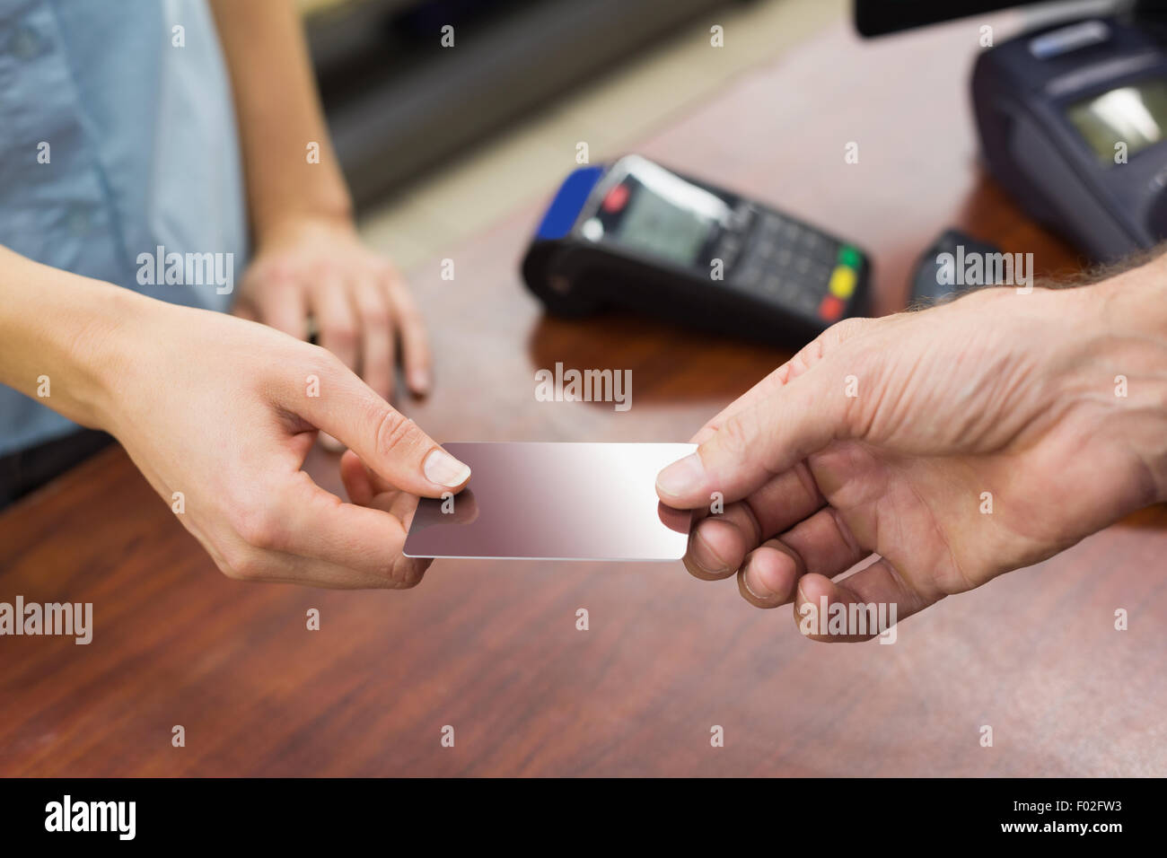 Man cash register hi-res stock photography and images - Alamy