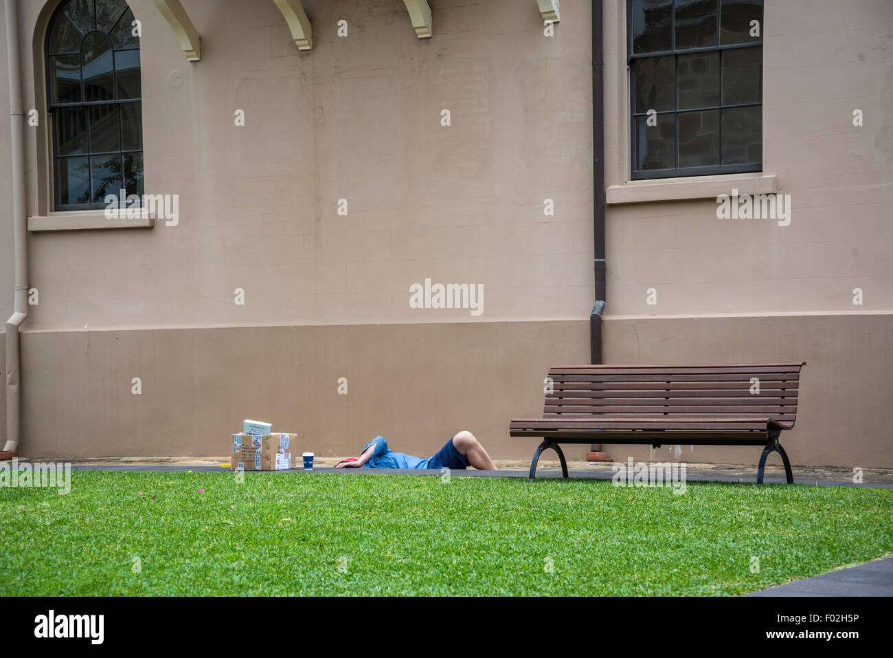 Workman fixing something under ground, Sydney, Australia Stock Photo ...