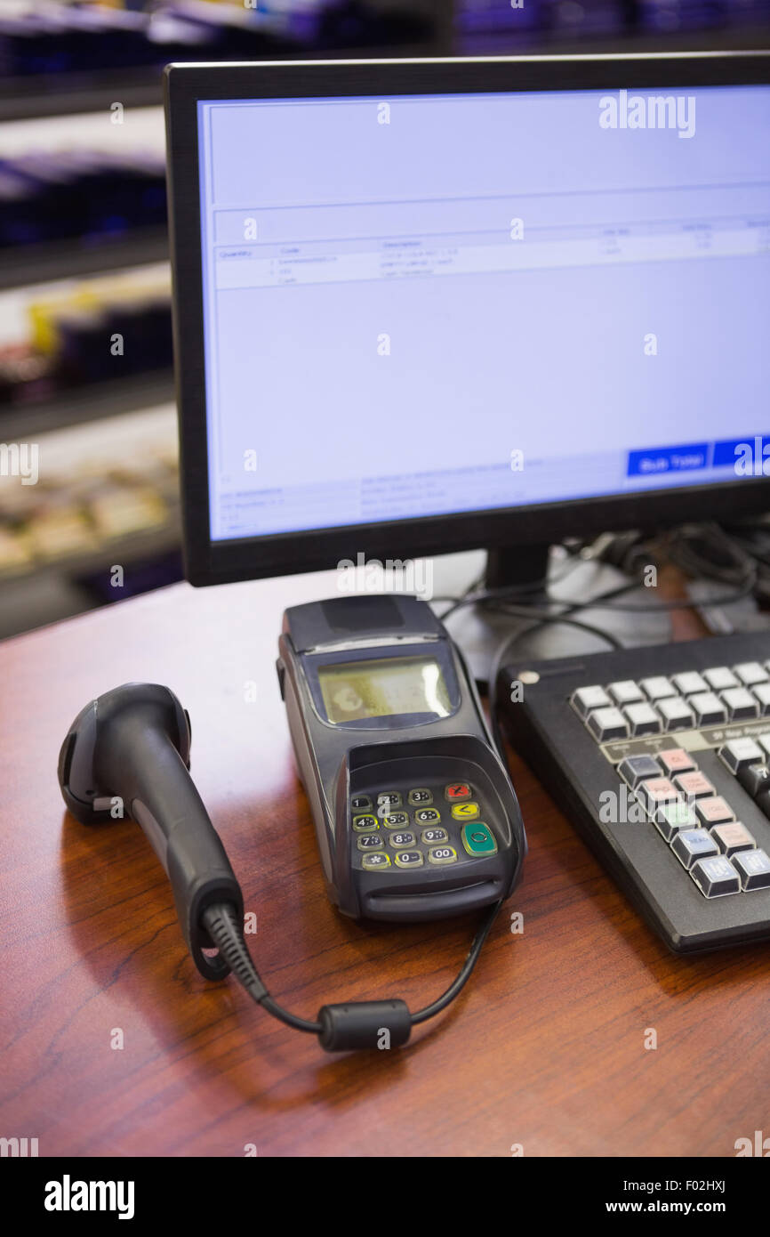 A cash register on wooden table Stock Photo - Alamy