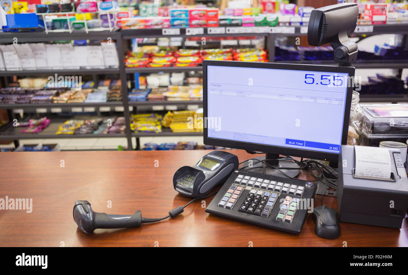 Cash register on wooden table Stock Photo - Alamy