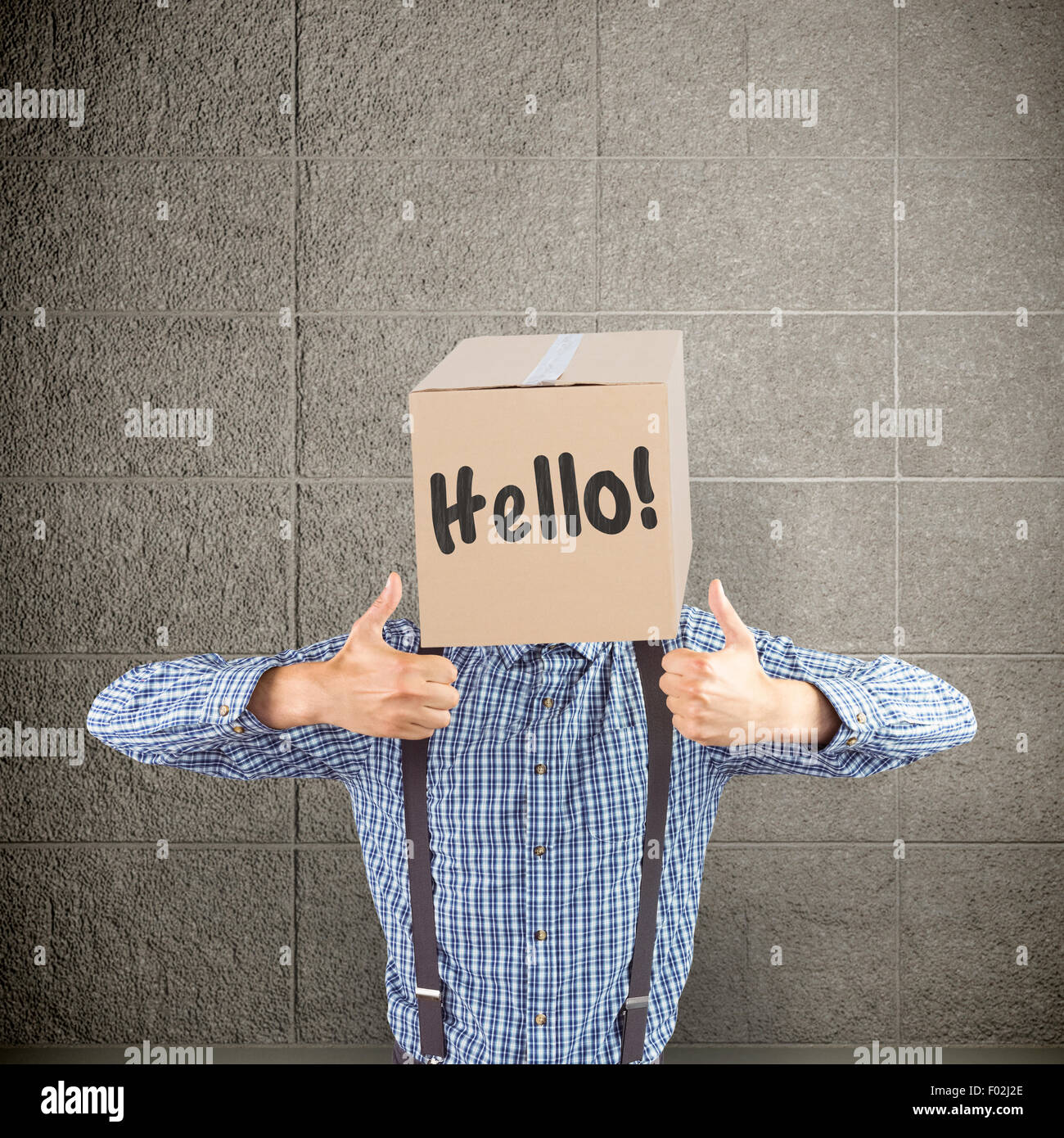 Composite image of anonymous businessman with thumbs up Stock Photo - Alamy