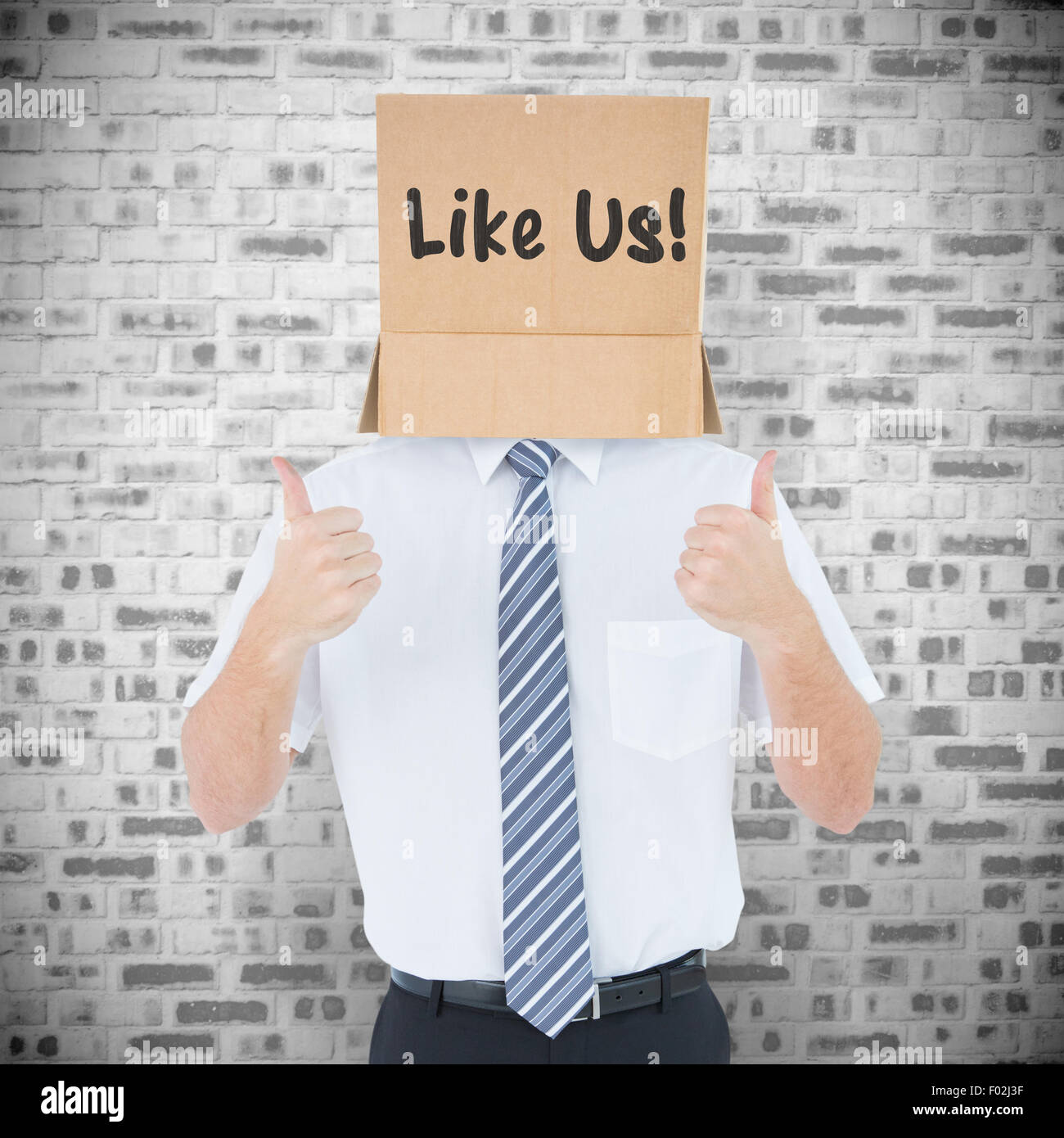 Composite image of anonymous businessman showing thumbs up Stock Photo ...