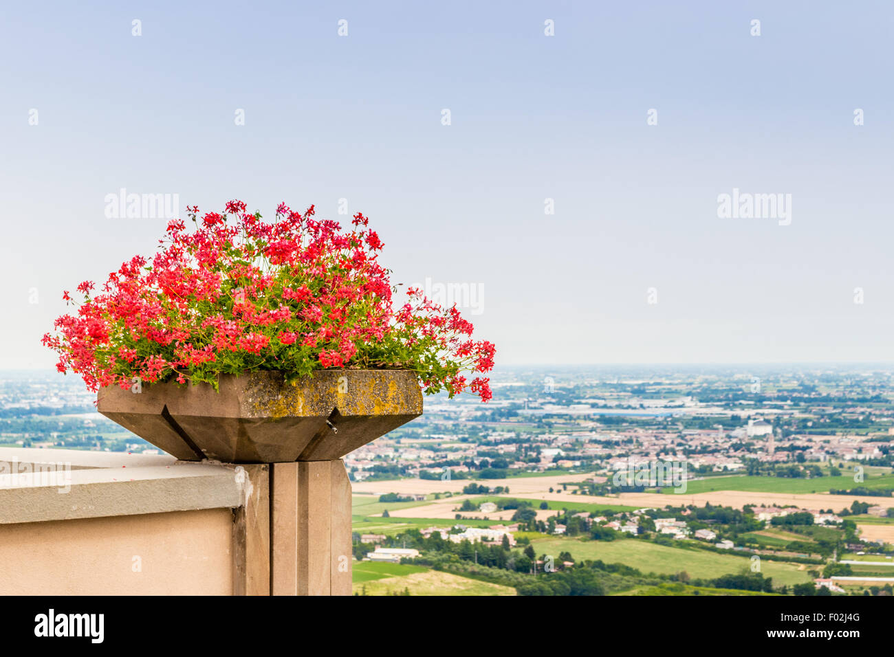 nature and memories - pot of geraniums and view from the terrace of the ...
