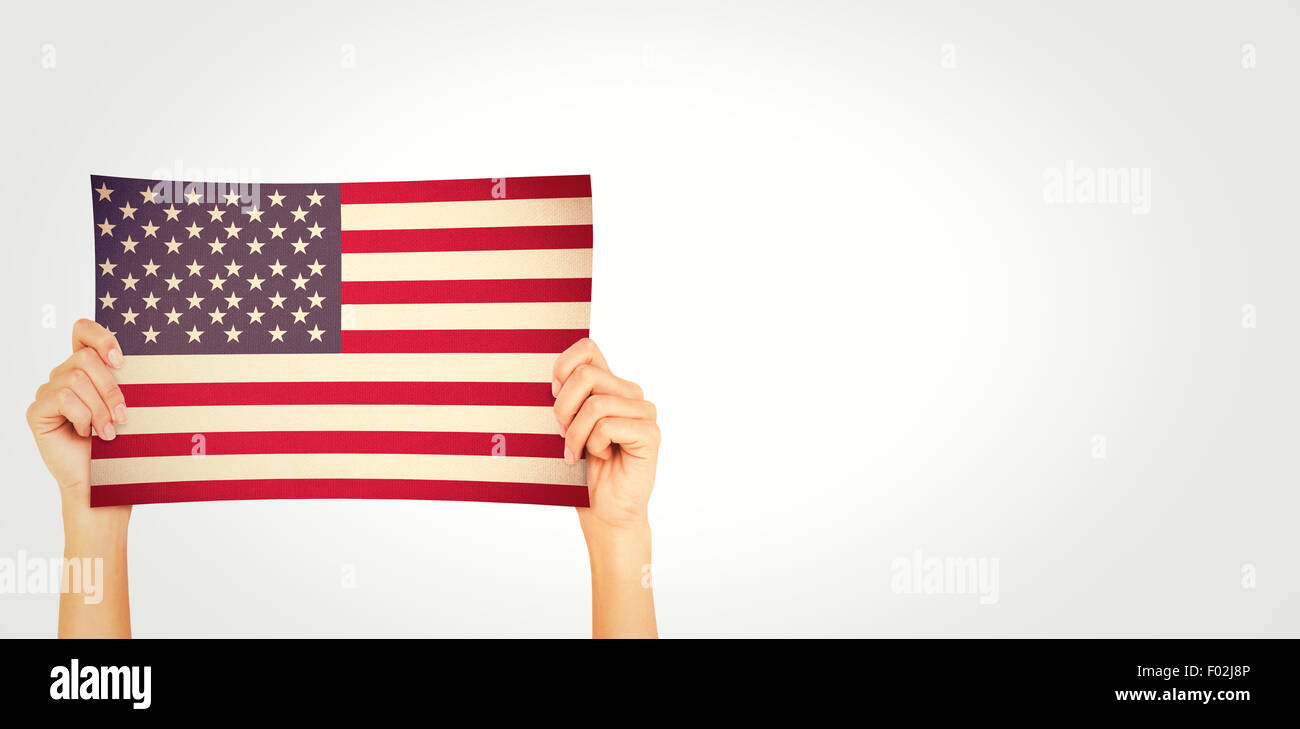 Composite image of hand showing card Stock Photo - Alamy