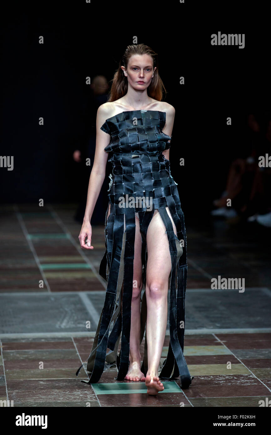 Copenhagen, Denmark, August 6th, 2014. A model walks the runway wearing ...