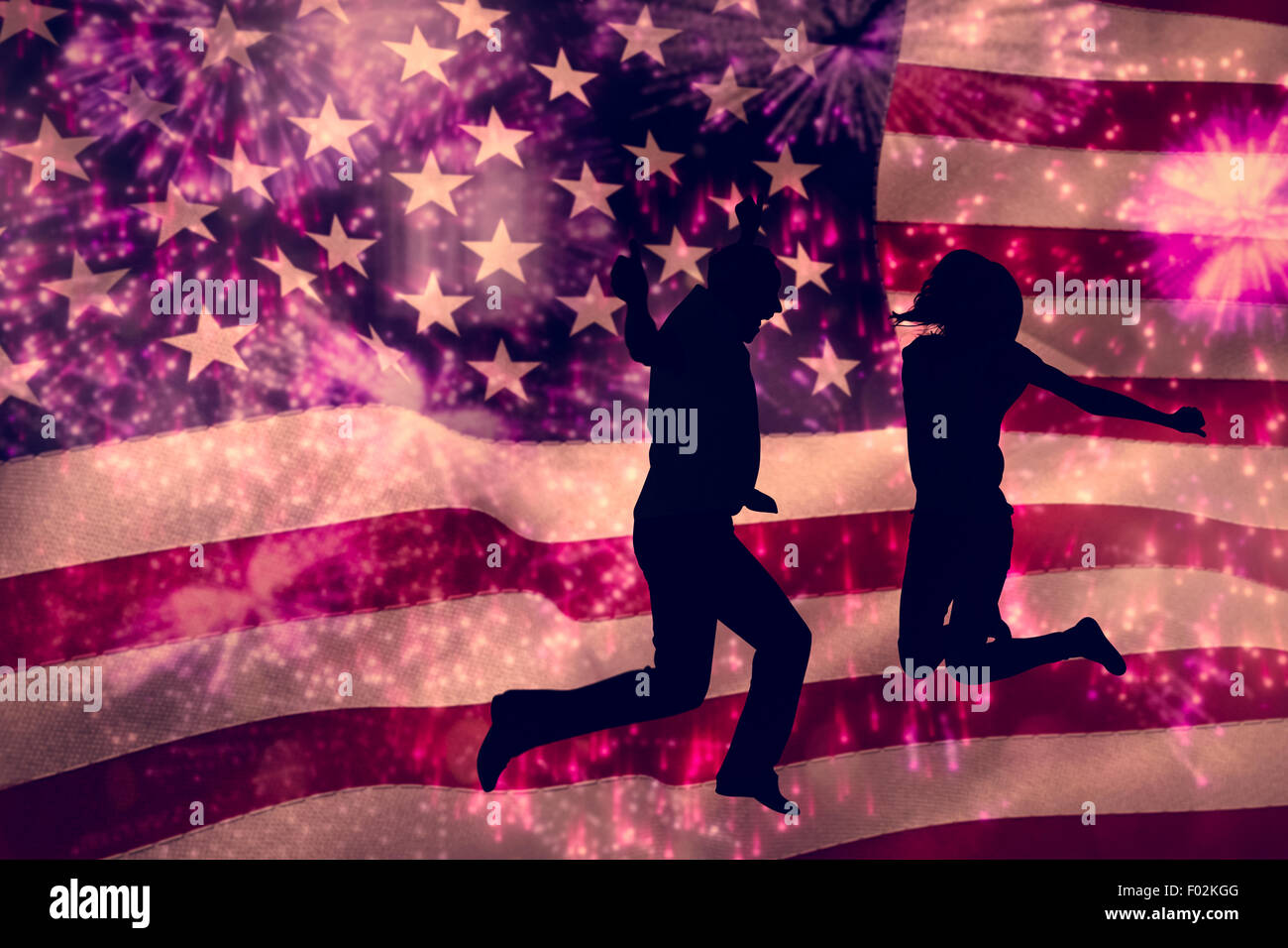 Composite image of excited couple cheering and jumping Stock Photo - Alamy