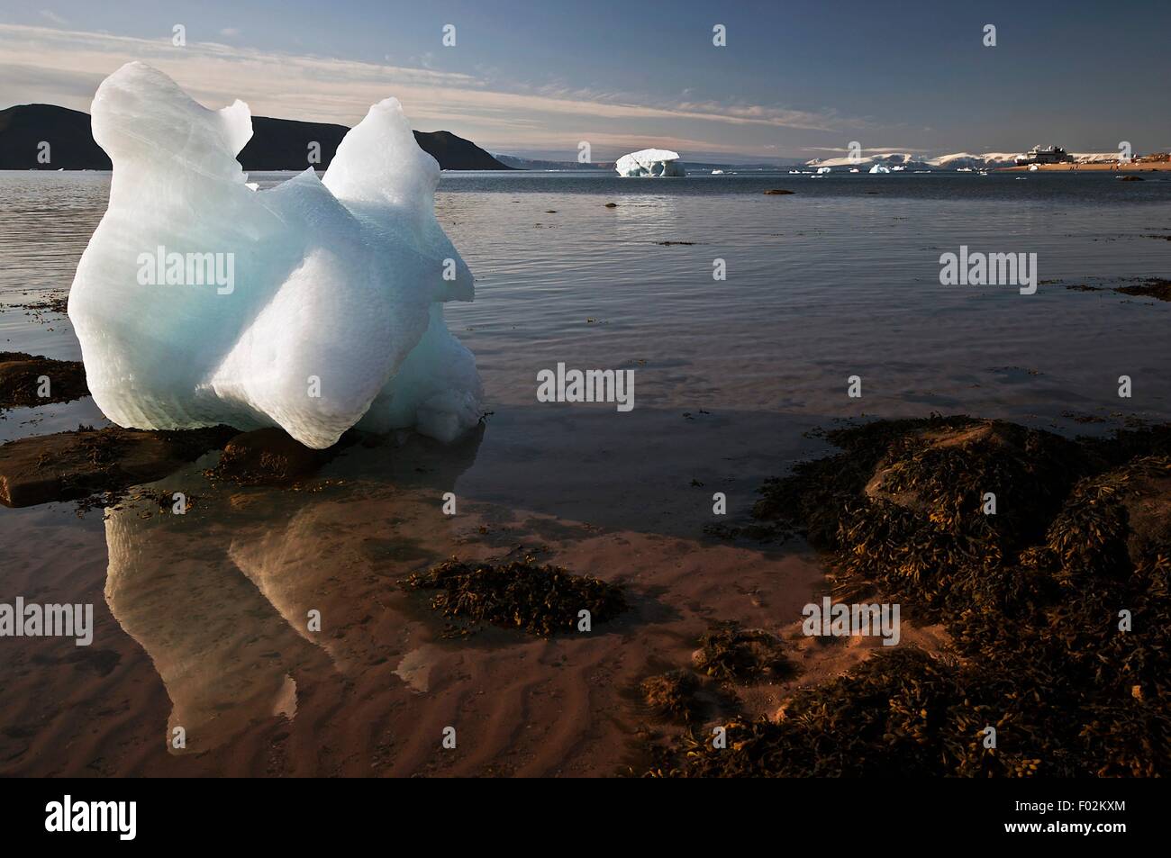 Beached iceberg near Siorapaluk on the Nares Strait, Greenland, Denmark ...