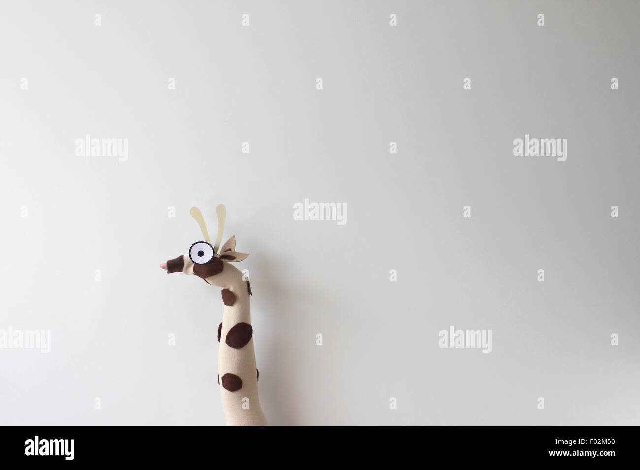 Giraffe hand puppet Stock Photo - Alamy