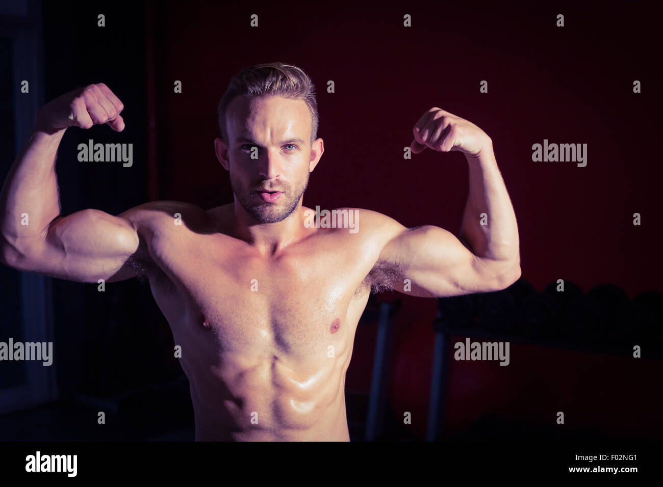 Man flexing biceps arm hi-res stock photography and images - Alamy