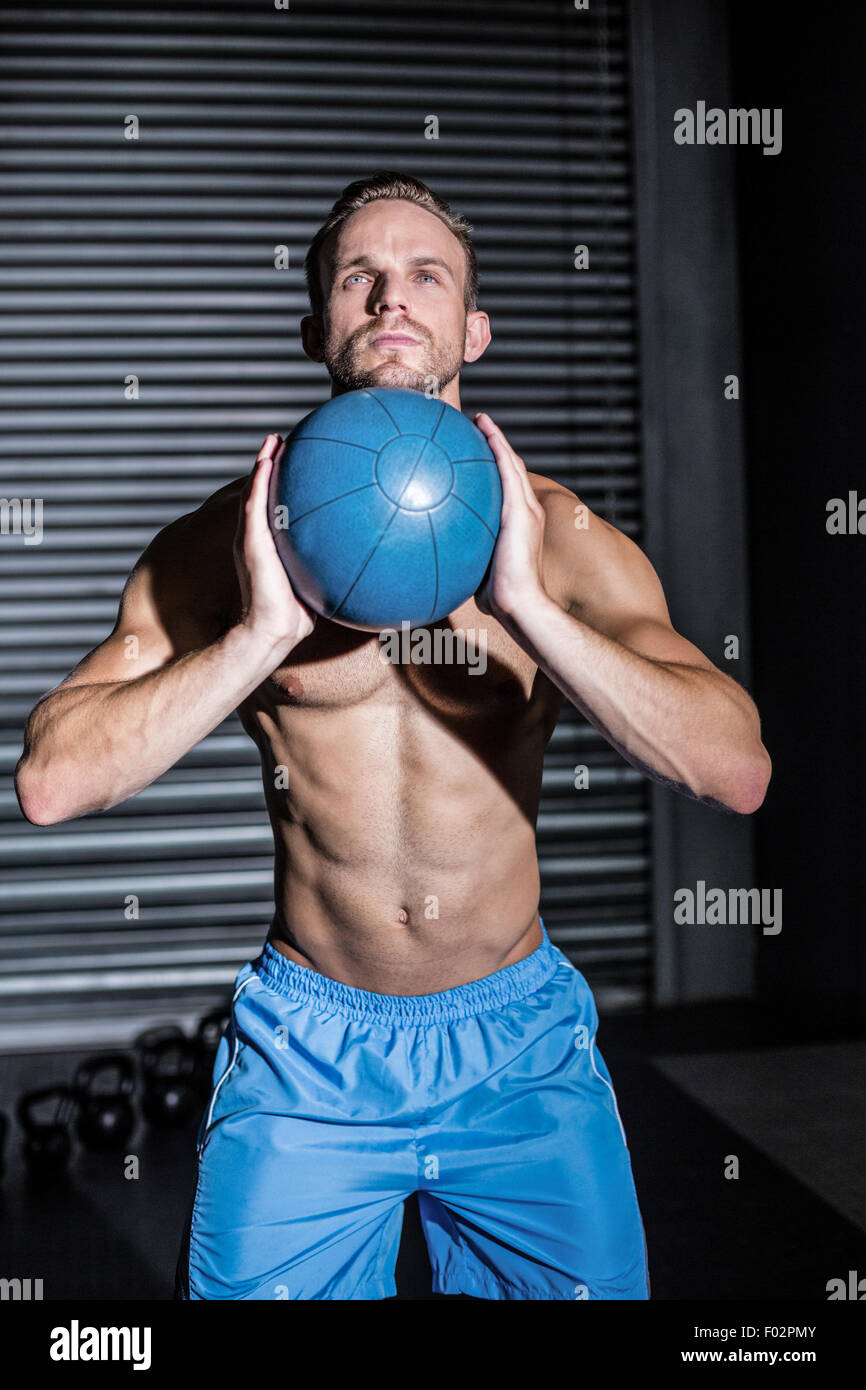 Young muscular man doing exercise hi-res stock photography and images ...