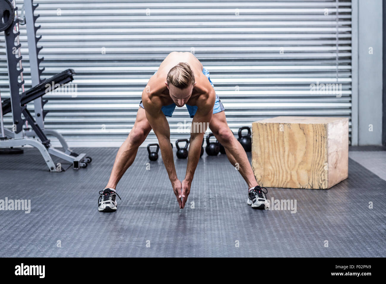 Stretching strong attractive young hi-res stock photography and images ...