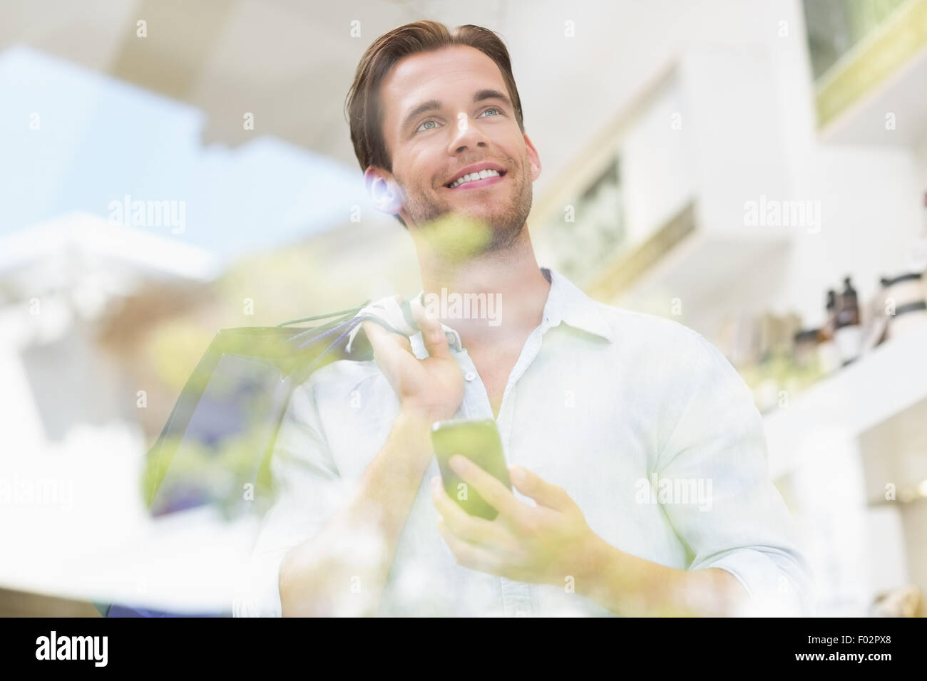 Man looking phone hi-res stock photography and images - Alamy