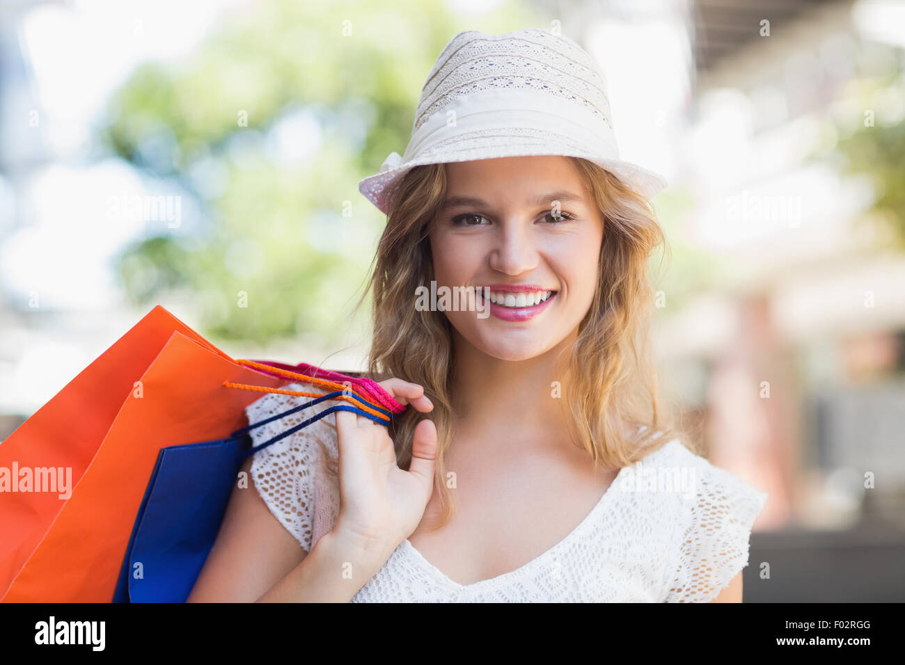 Pretty woman looking at the camera Stock Photo - Alamy