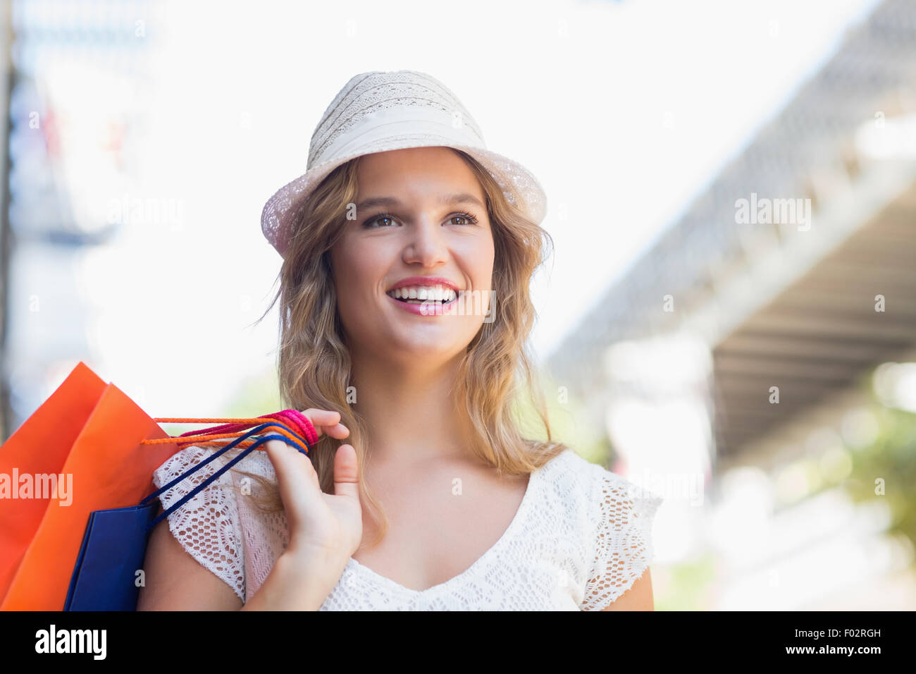 Pretty woman smiling looking away hi-res stock photography and images ...