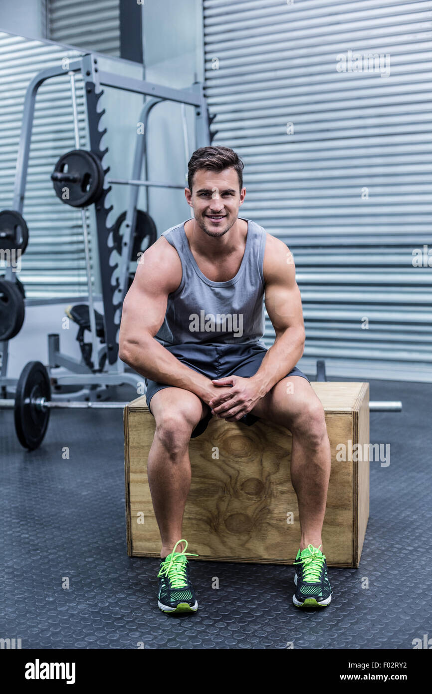 Smiling muscular man looking at the camera Stock Photo - Alamy