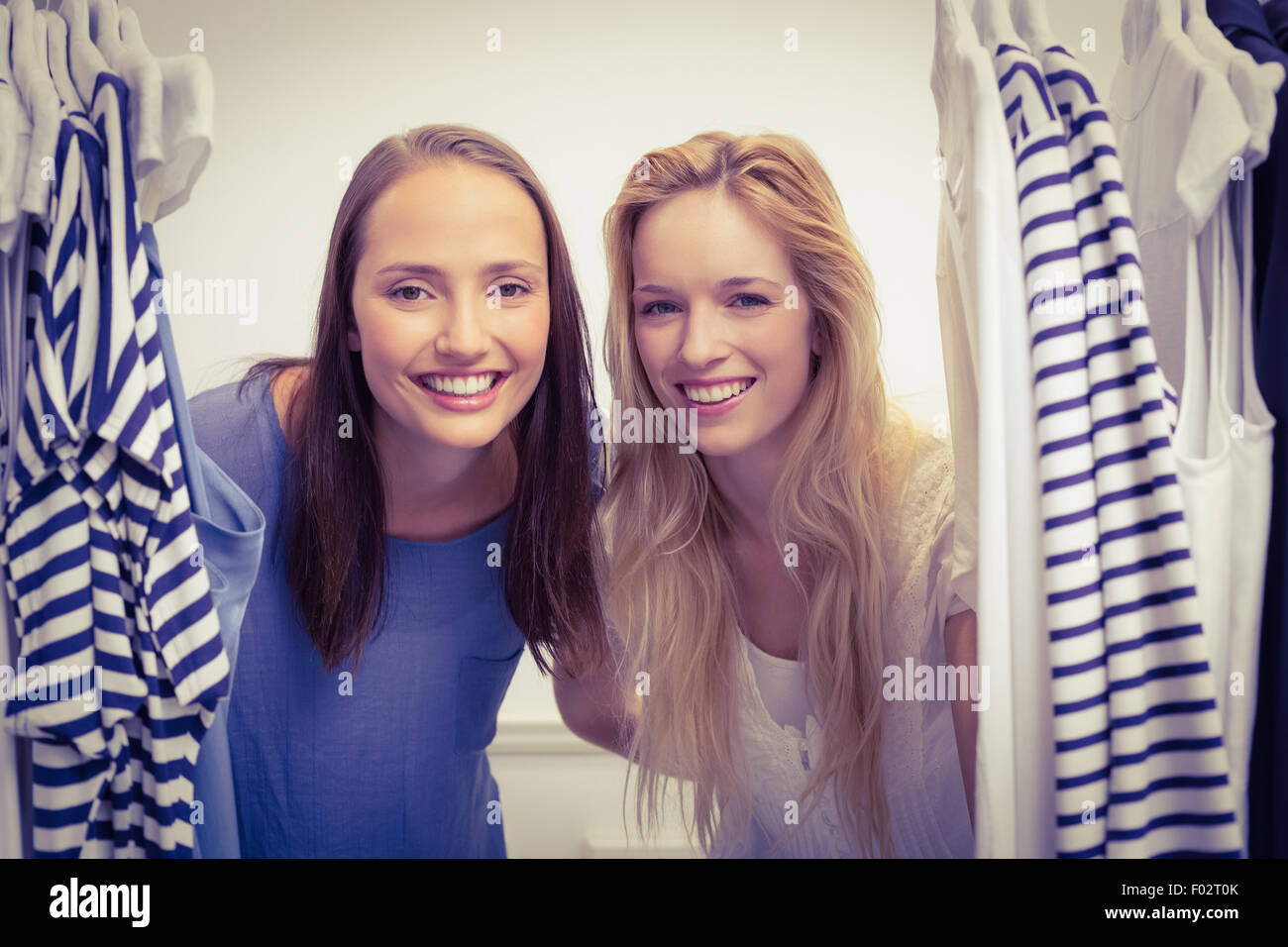 Woman browsing through clothes hi-res stock photography and images - Alamy
