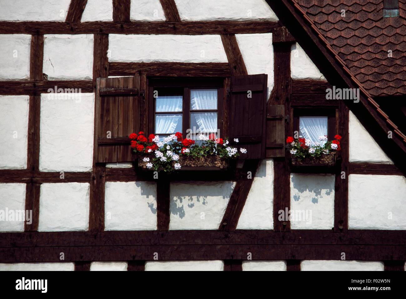 Windows with flower boxes in the historic centre of Nuremberg, Germany ...