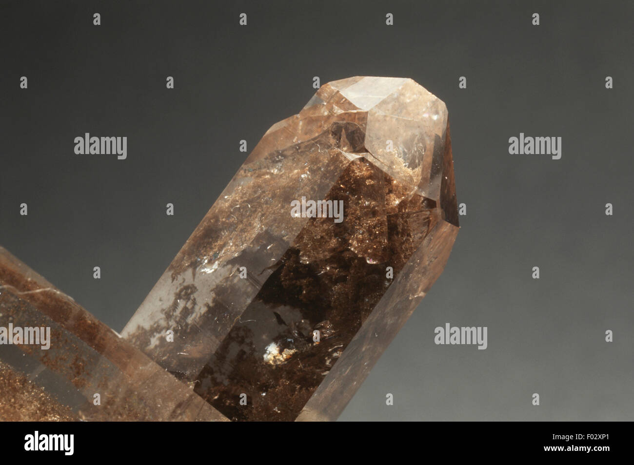 Quartz with inclusion Stock Photo - Alamy