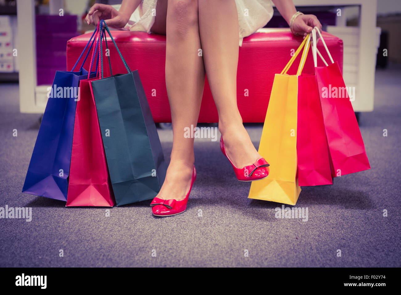 Woman legs crossed high heels hi-res stock photography and images - Alamy