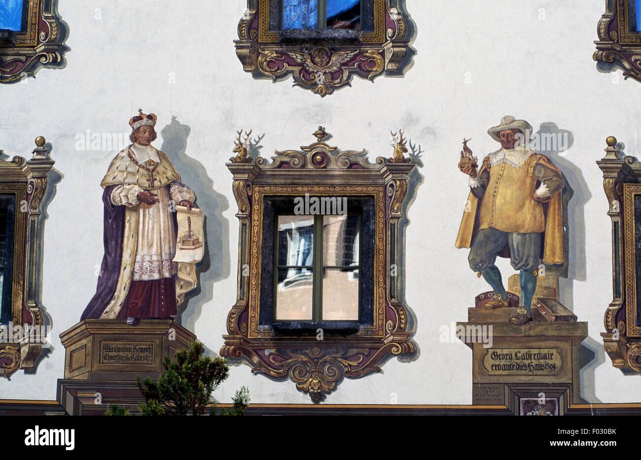 Windows with decorations and statues, Berchtesgaden, Bavaria, Germany ...