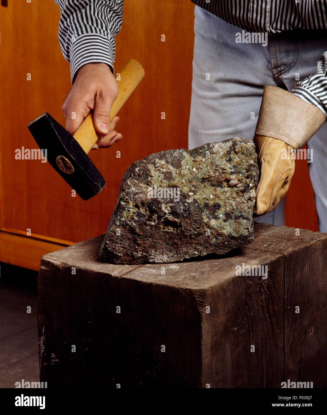 Preparation of samples of rock with a hammer Stock Photo - Alamy