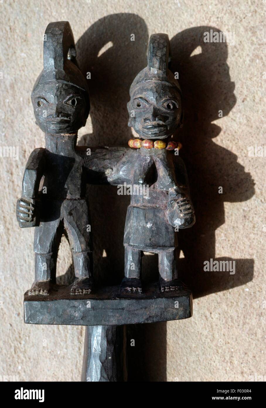 Wooden anthropomorphic statues, Benin Stock Photo - Alamy