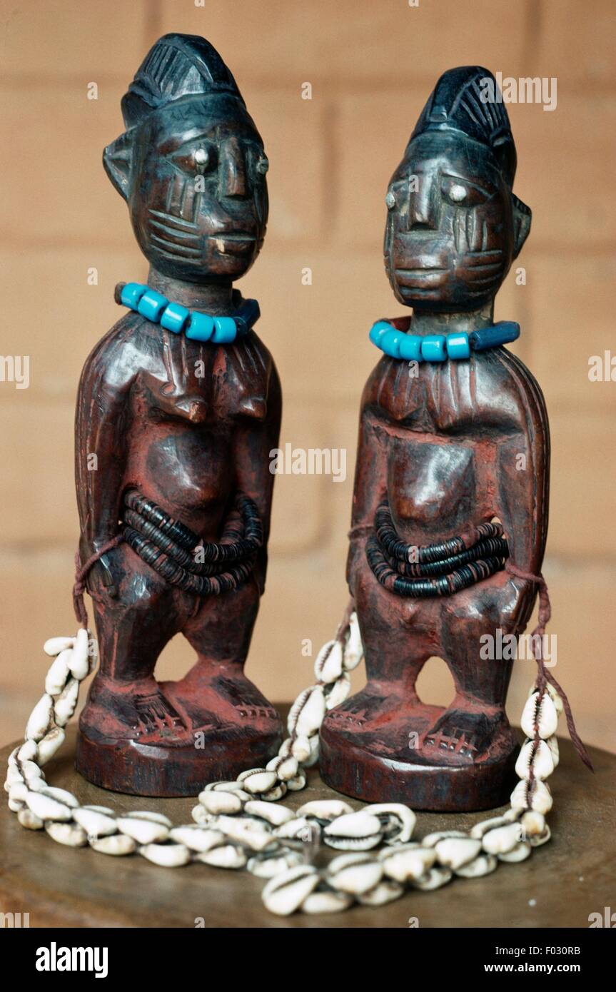 Wooden anthropomorphic statues, Benin Stock Photo - Alamy