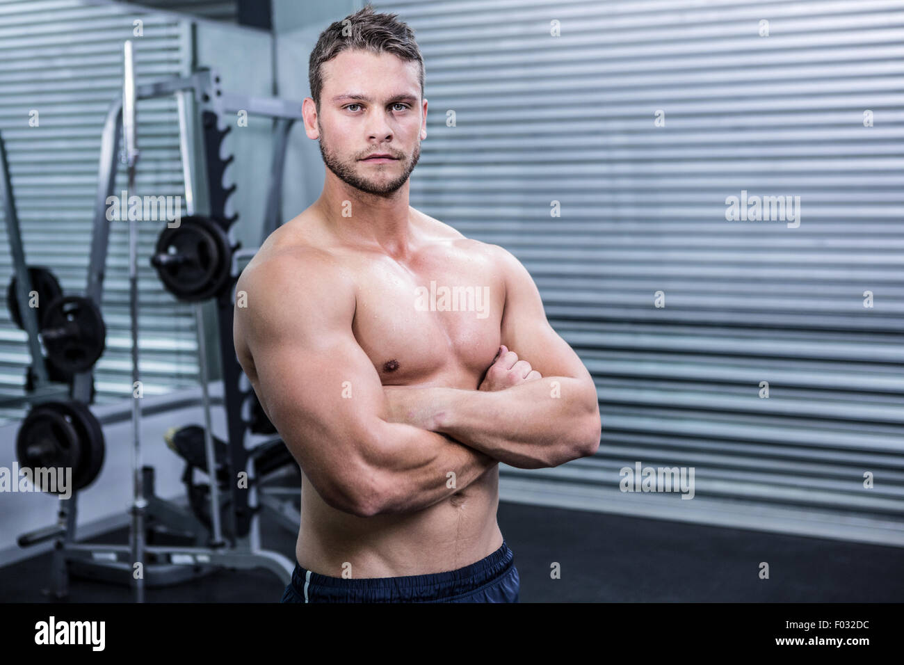 Portrait of muscular man looking at camera Stock Photo - Alamy