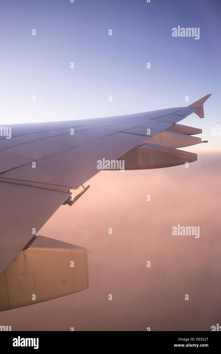 Airplane wing in flight Stock Photo - Alamy