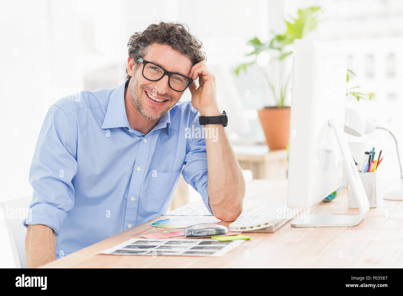 Mature businessman using office computer hi-res stock photography and ...