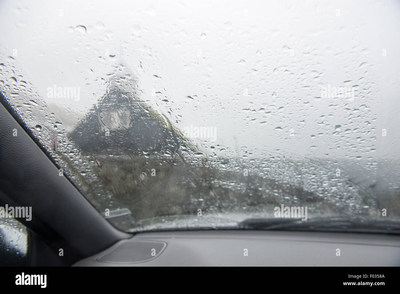 Car in rain water hi-res stock photography and images - Alamy