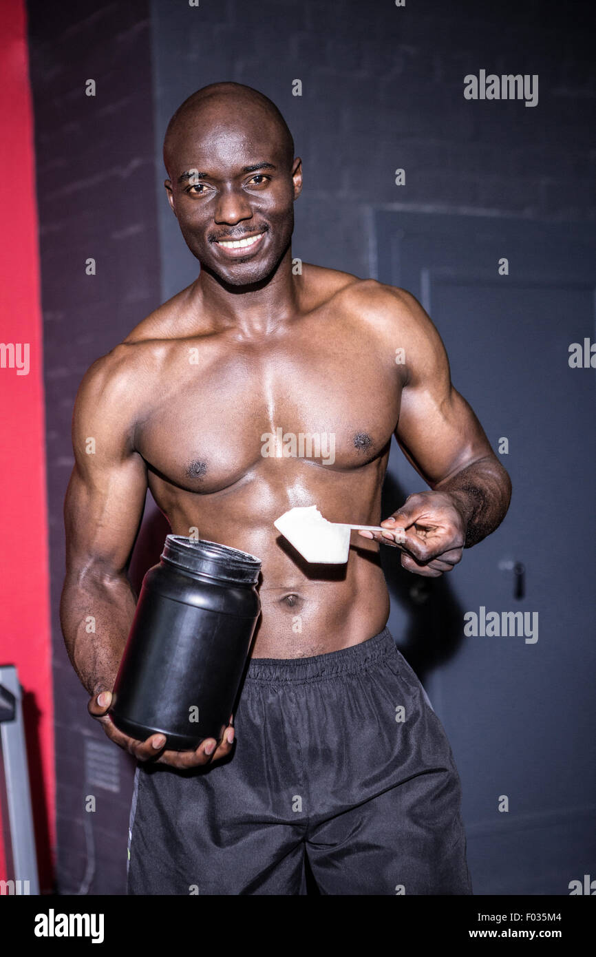 Young Bodybuilder filling his Bottle Stock Photo - Alamy