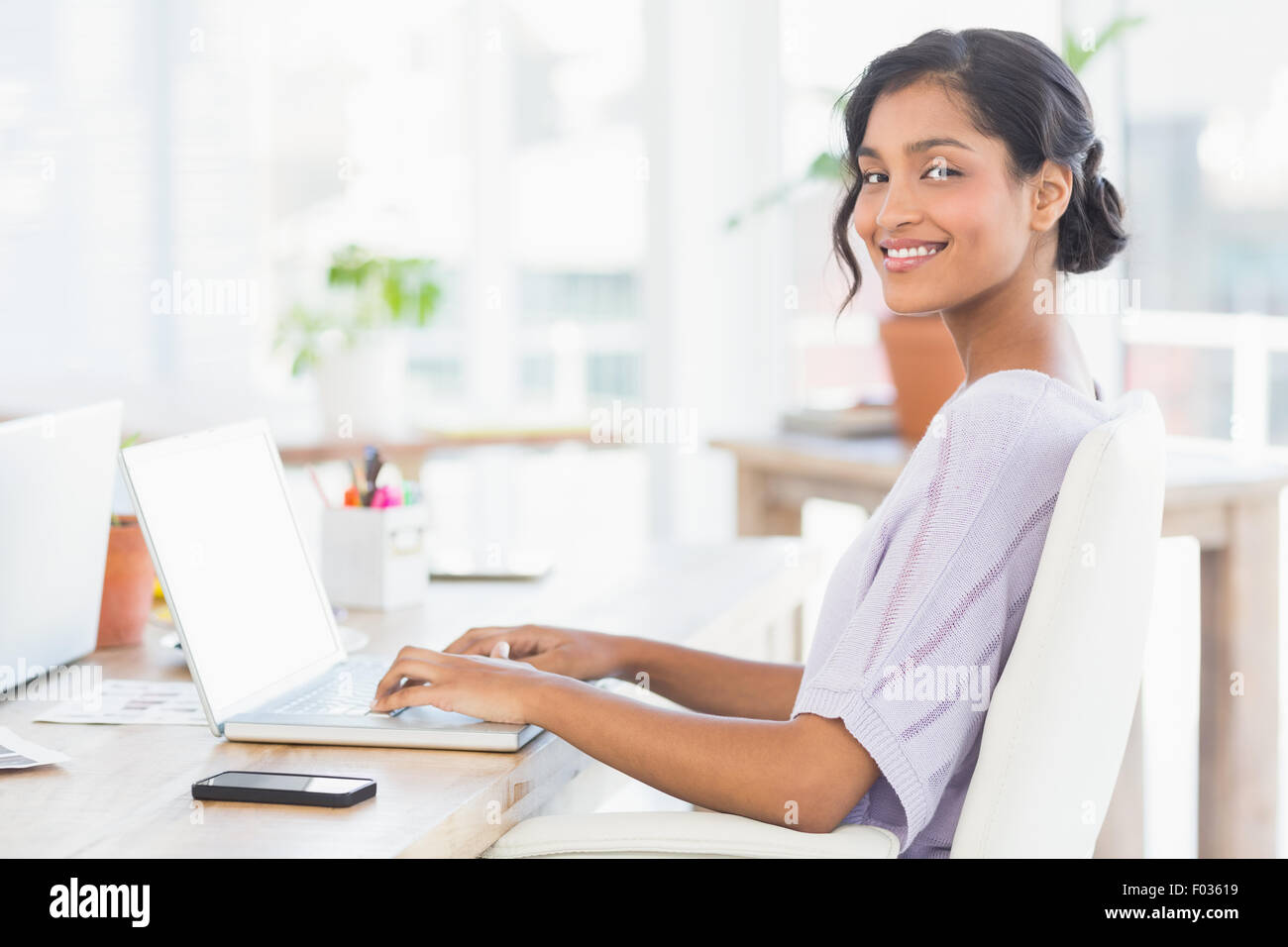 Attractive woman using laptop drawing hi-res stock photography and ...