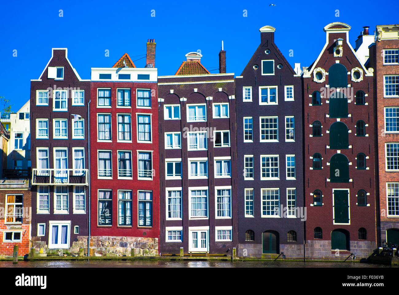 Traditional dutch medieval buildings in Amsterdam Stock Photo - Alamy