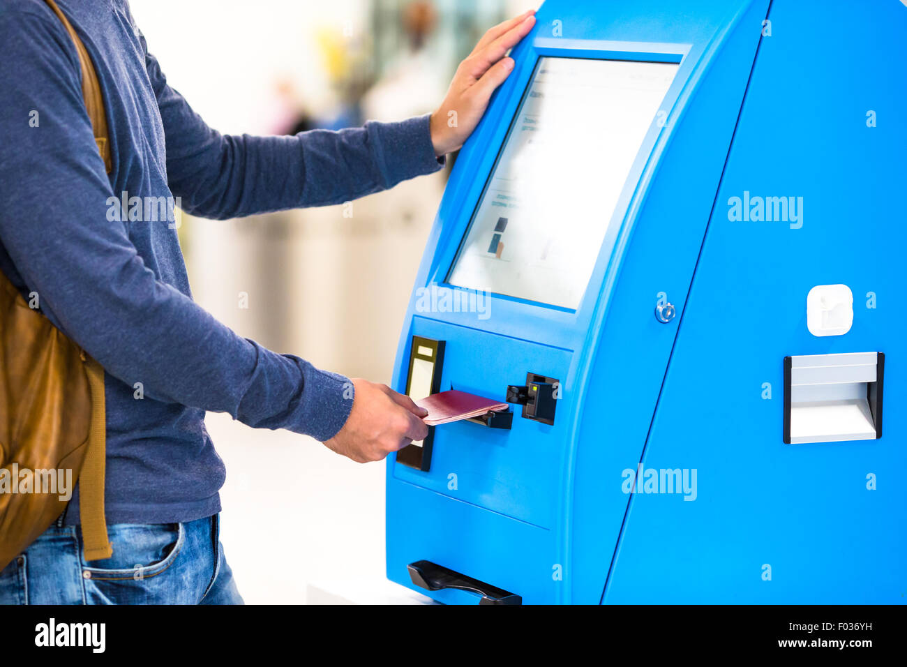 Close-up display at self-service transfer machine, doing self-check-in ...