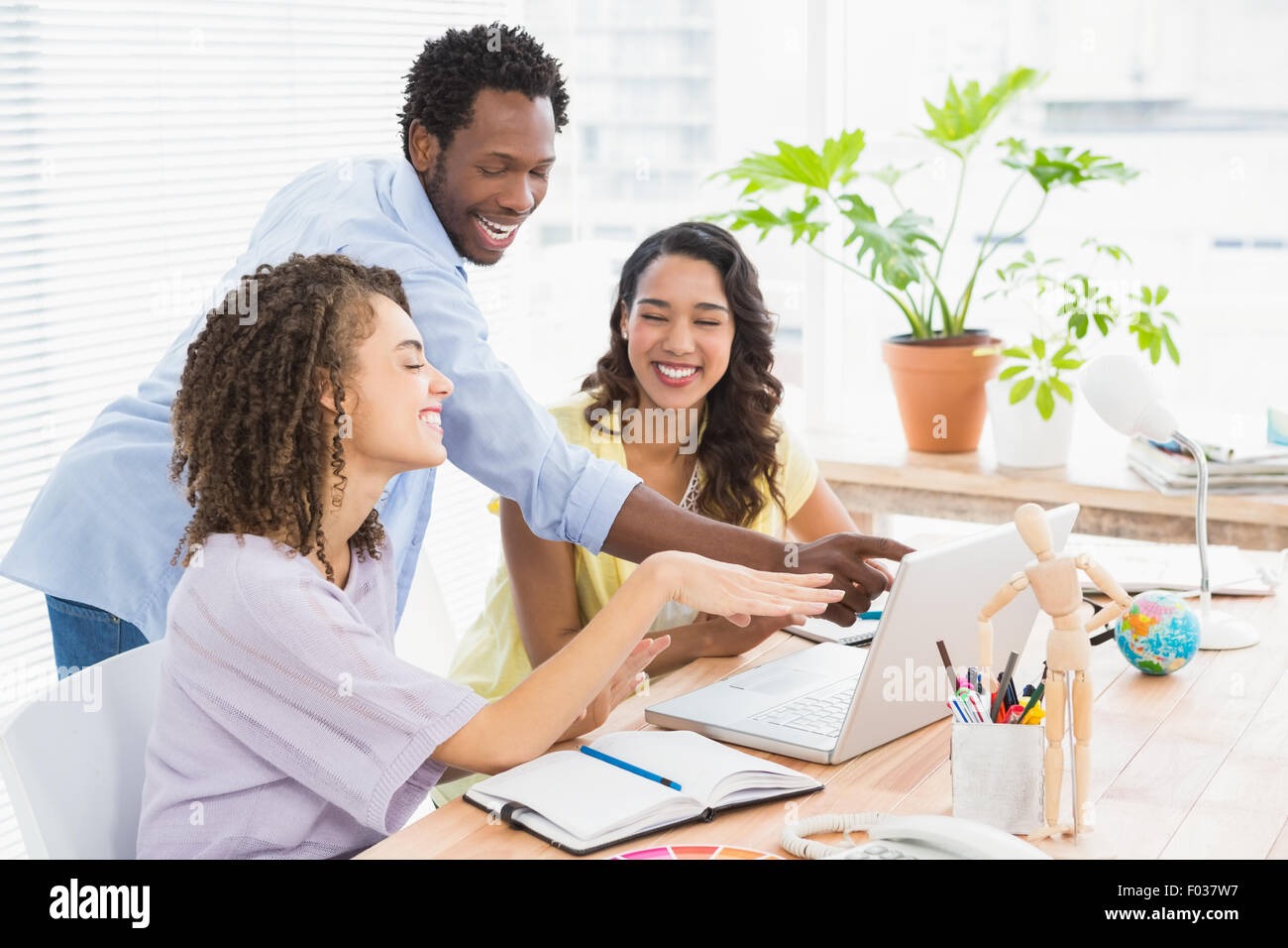 Group graphic designer interacting using hi-res stock photography and images - Alamy